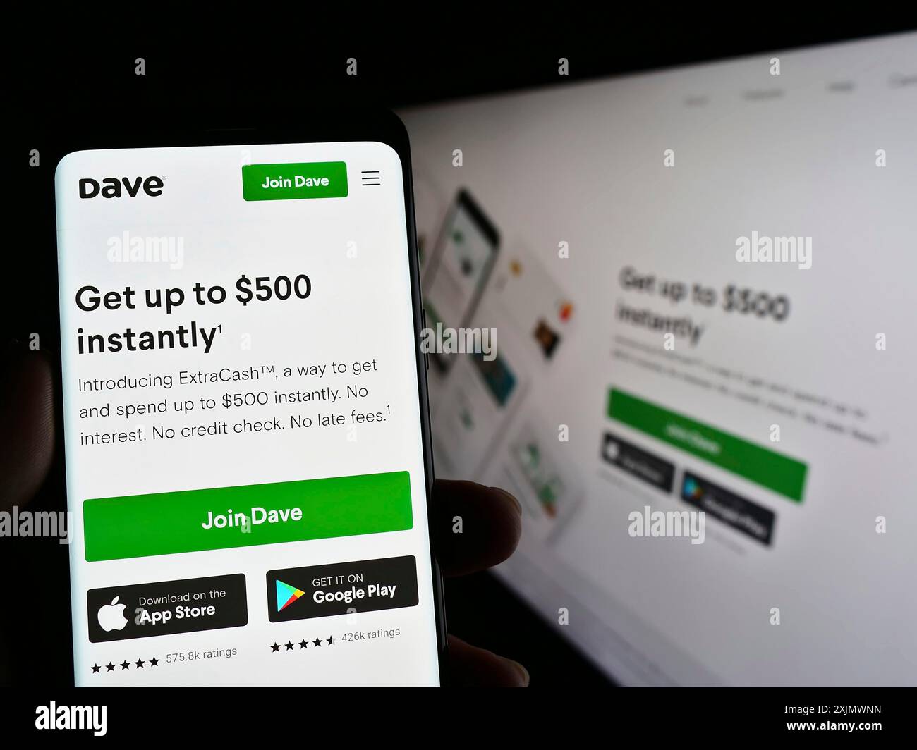 Stuttgart, Germany, 12-02-2022: Person holding cellphone with website ...