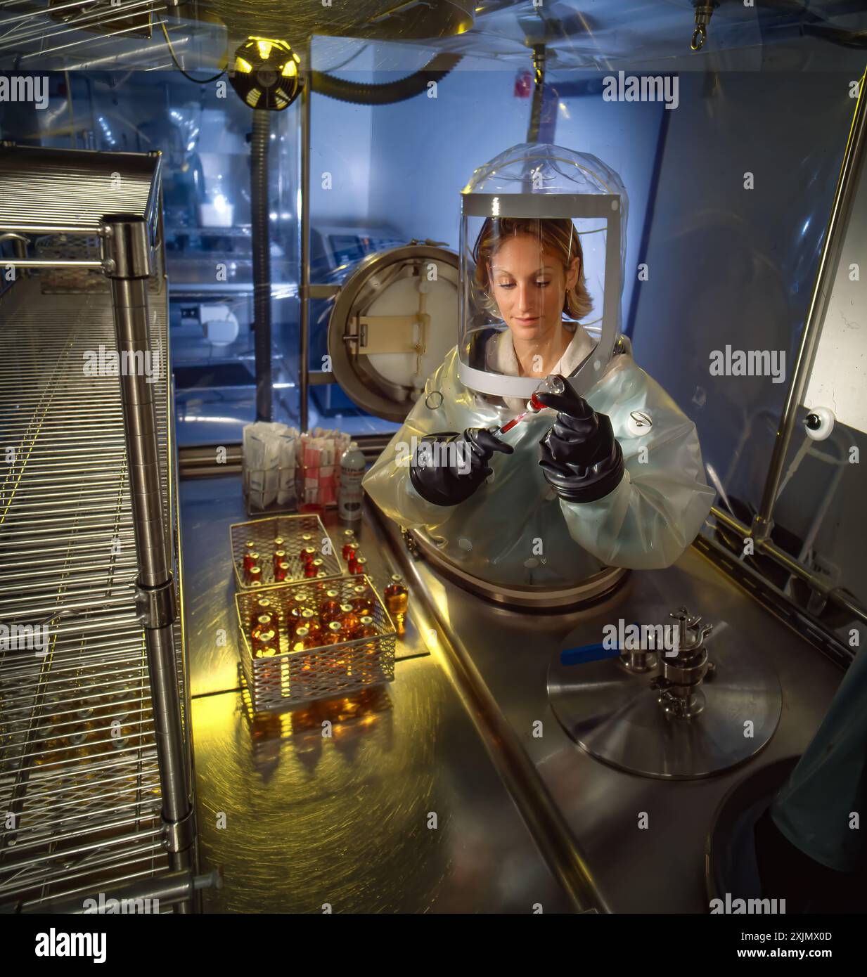 Scientist in hazard sterile suit hi-res stock photography and images ...