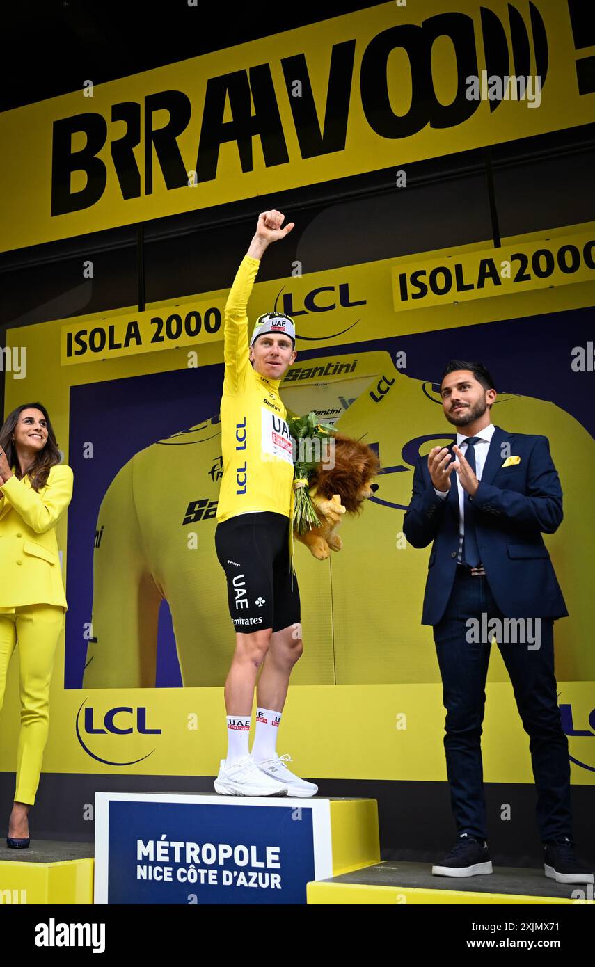 Slovenian Tadej Pogacar of UAE Team Emirates celebrates on the podium ...
