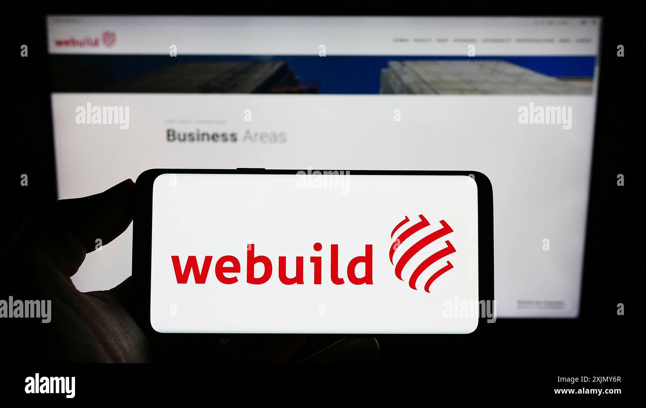 Stuttgart, Germany, 12-30-2022: Person holding smartphone with logo of ...