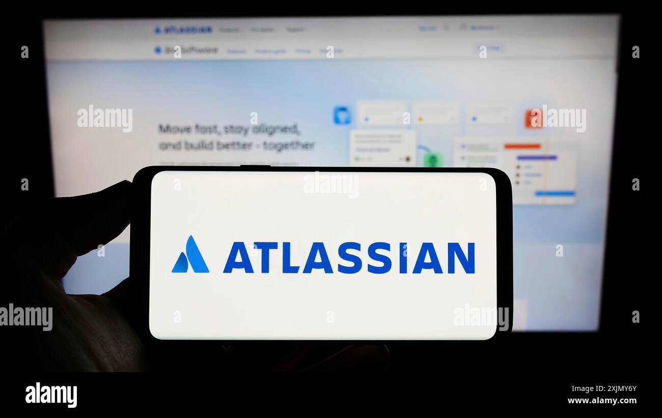 Stuttgart, Germany, 12-30-2022: Person holding cellphone with logo of ...