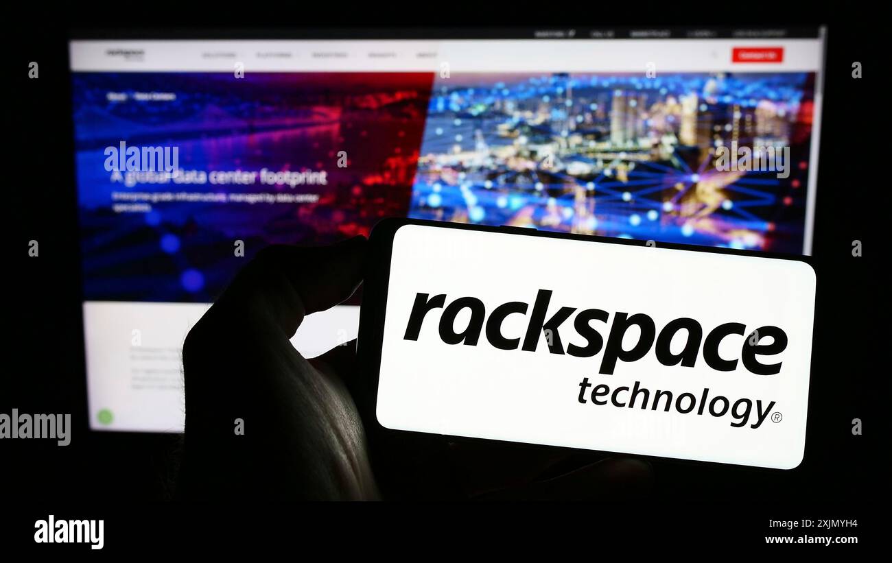 Stuttgart, Germany, 12-31-2022: Person holding smartphone with logo of ...