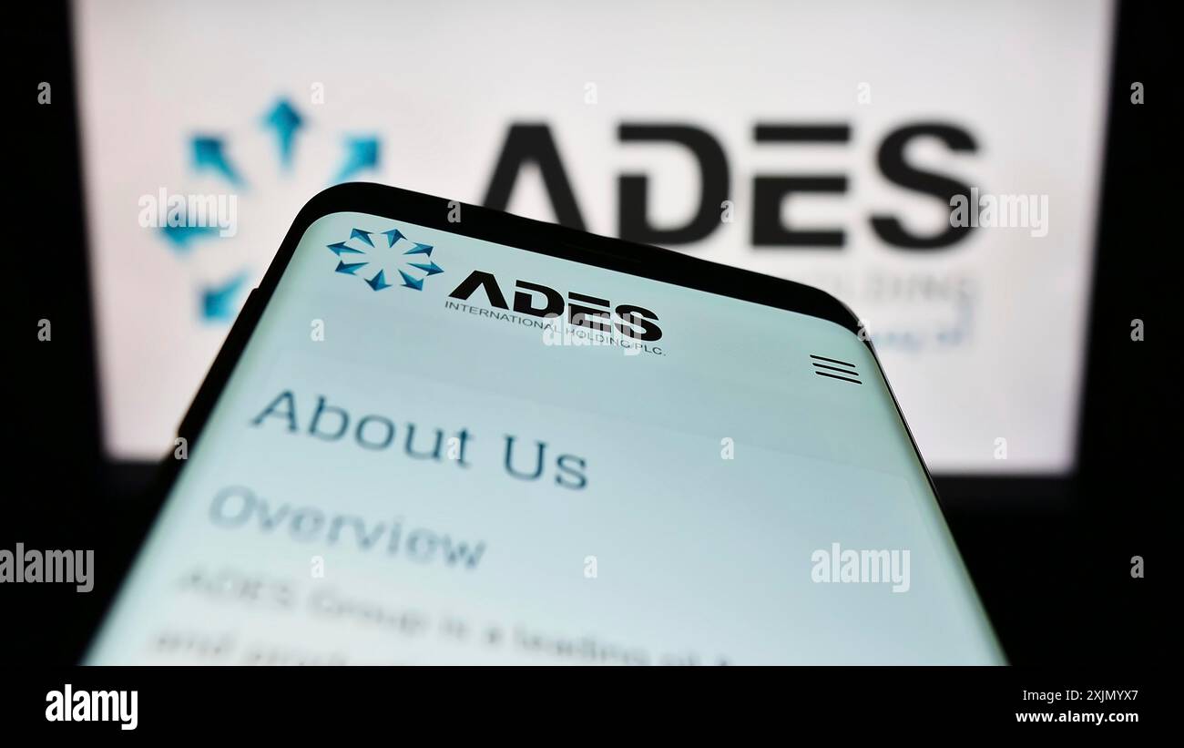 Stuttgart, Germany, 12-25-2022: Mobile phone with webpage of Egyptian company ADES International ...