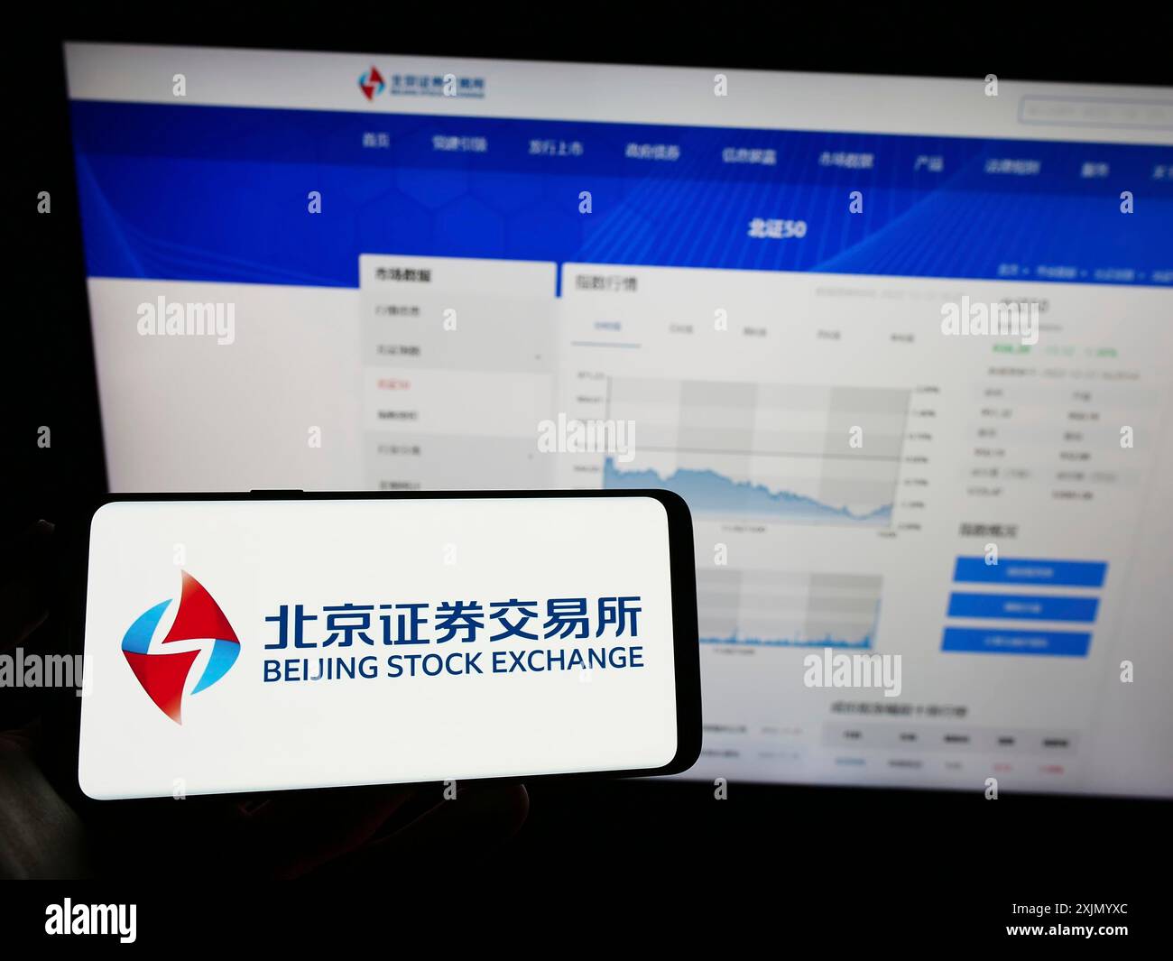 Stuttgart, Germany, 12-25-2022: Person holding mobile phone with logo ...