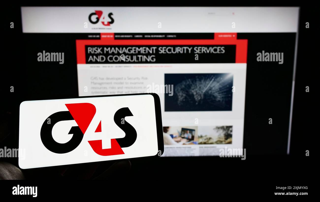 Stuttgart, Germany, 12-25-2022: Person holding mobile phone with logo ...