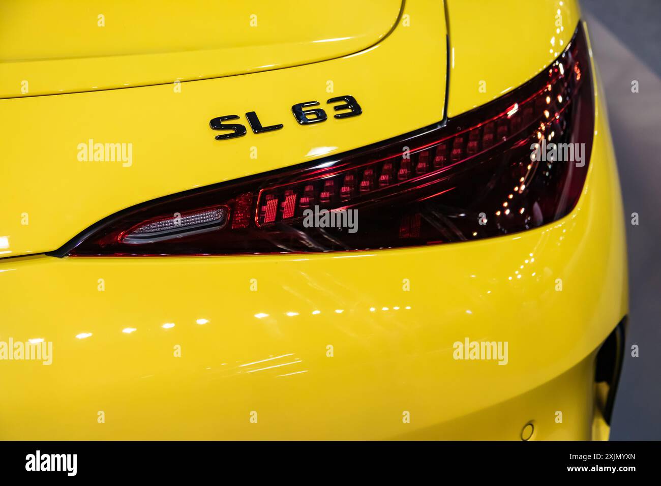 Details of Mercedes Benz SL63 V8 Turbo AMG in yellow is a luxury sports ...