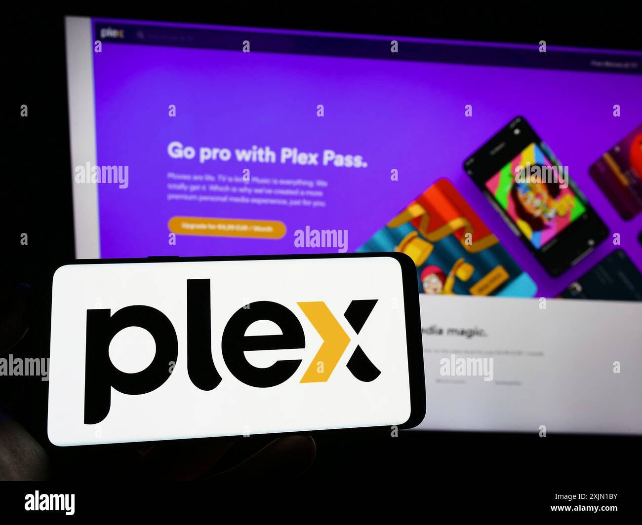 Stuttgart, Germany, 01-14-2023: Person holding cellphone with logo of US video streaming company ...