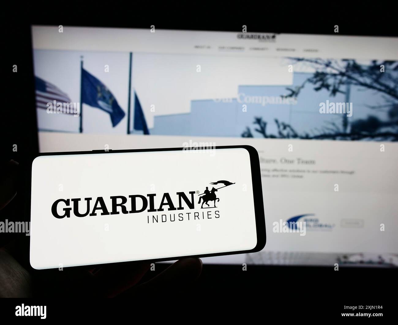 Stuttgart, Germany, 01-25-2023: Person holding mobile phone with logo ...