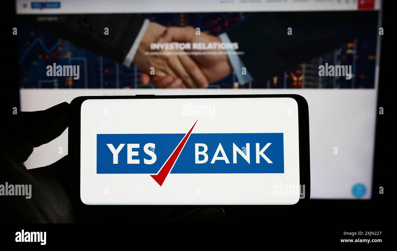 Stuttgart, Germany, 01-27-2023: Person holding cellphone with logo of Indian financial services ...