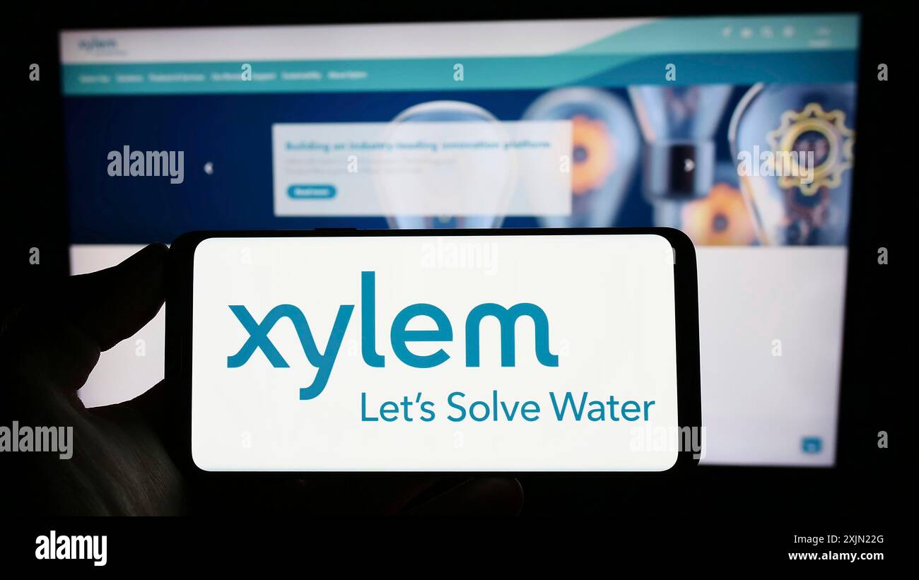 Stuttgart, Germany, 01-28-2023: Person holding smartphone with logo of ...