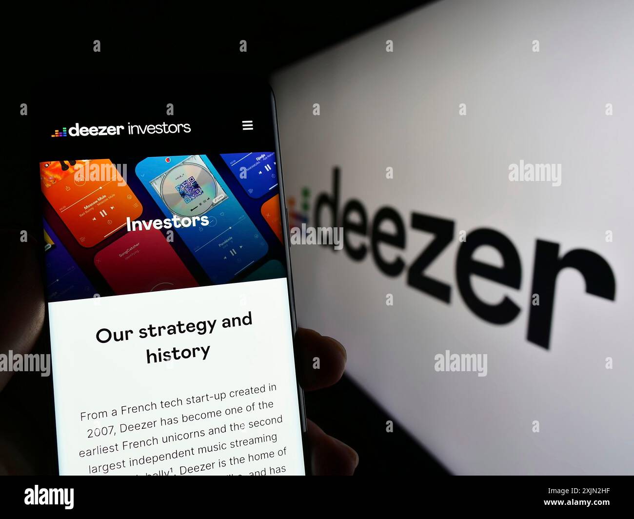 Stuttgart, Germany, 03-08-2023: Person holding smartphone with website ...