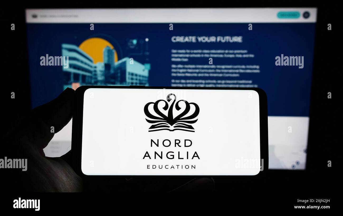 Stuttgart, Germany, 03-08-2023: Person holding smartphone with logo of ...