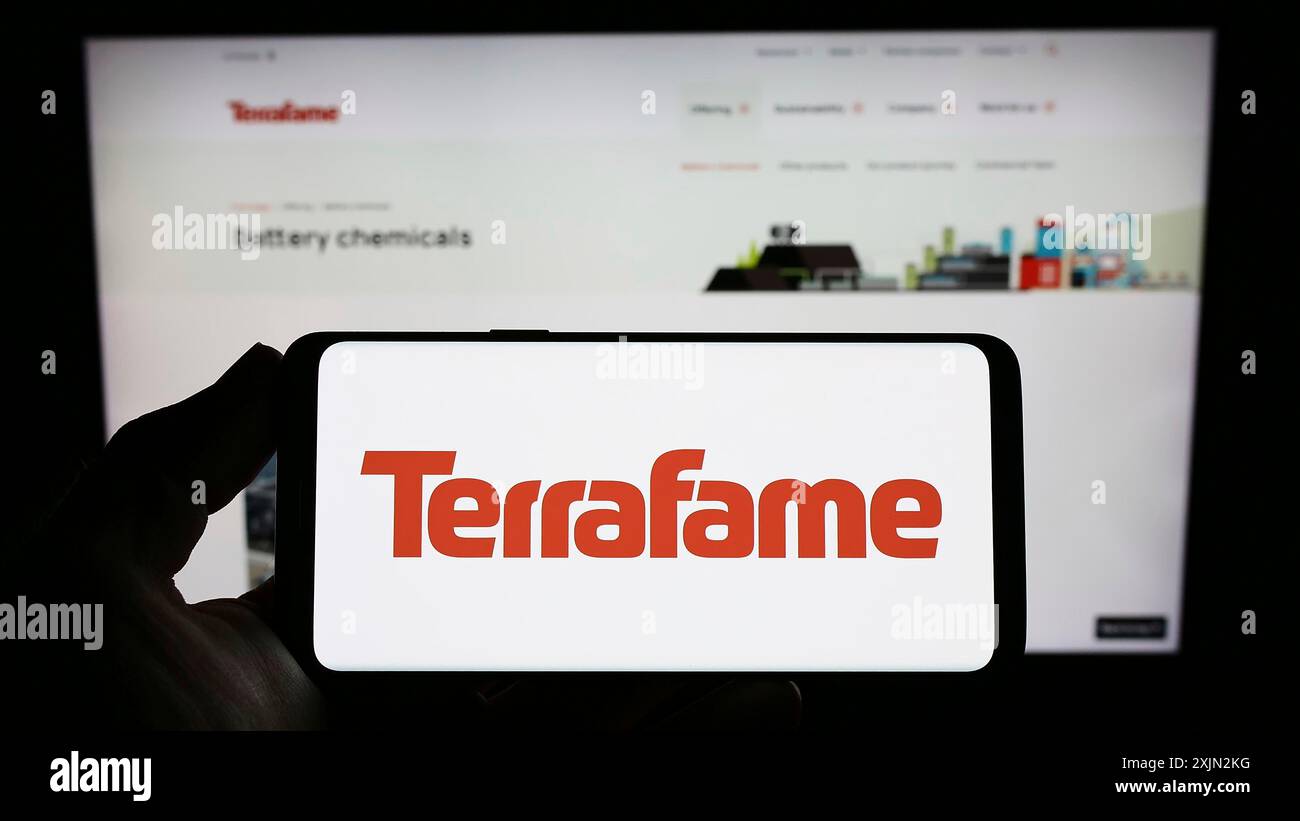 Stuttgart, Germany, 03-08-2023: Person holding smartphone with logo of ...