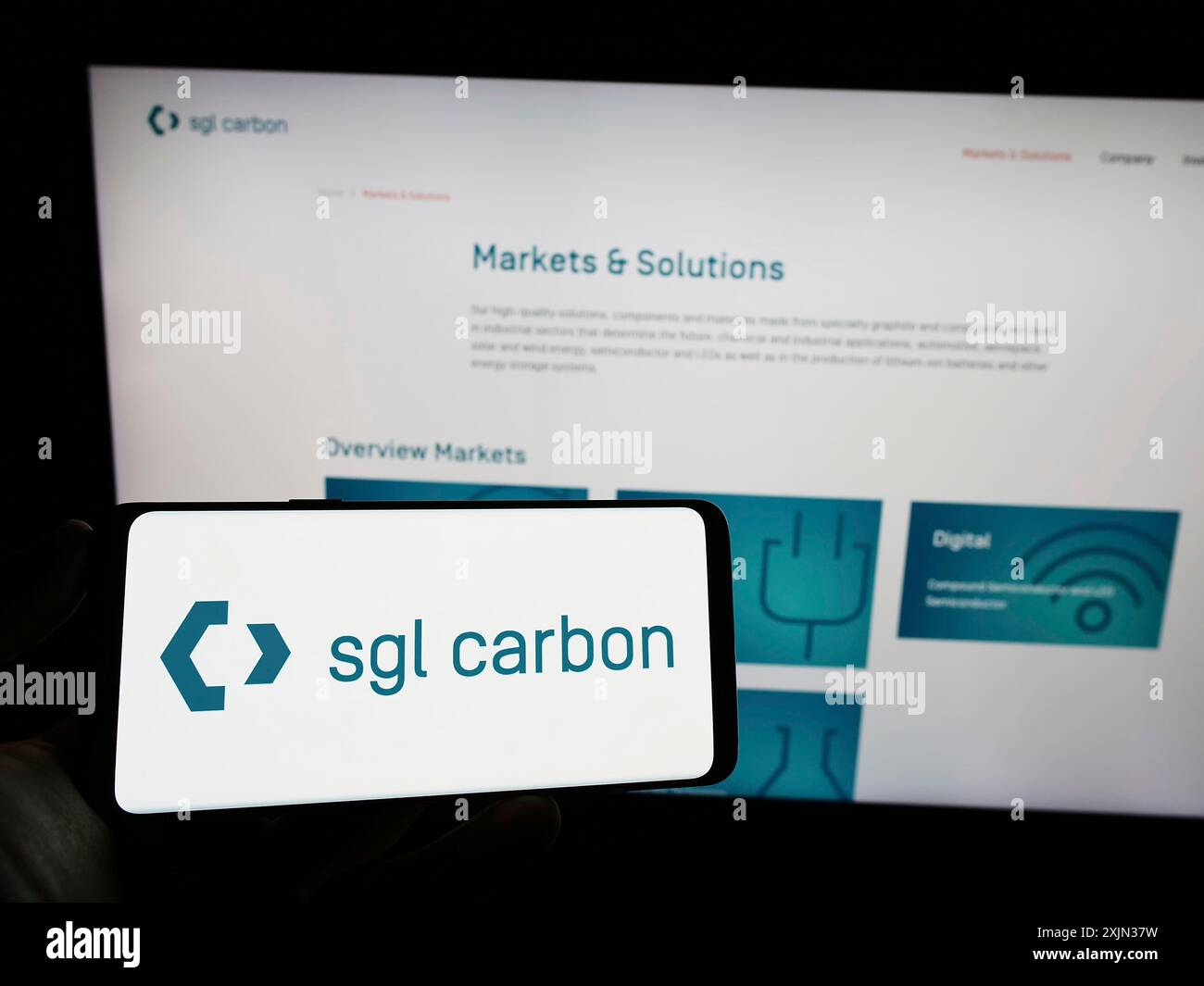 Stuttgart, Germany, 03-13-2023: Person holding mobile phone with logo ...