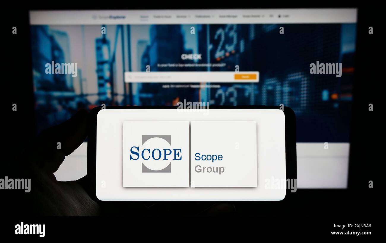 Stuttgart, Germany, 03-13-2023: Person holding smartphone with logo of European fund rating ...