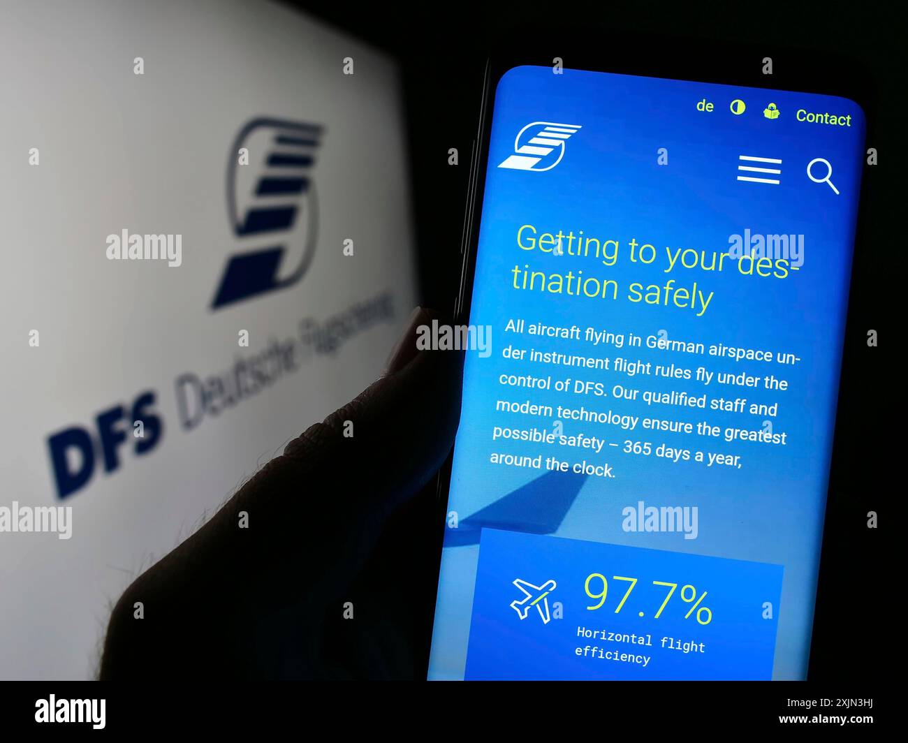 Stuttgart, Germany, 03-18-2023: Person holding cellphone with web page ...