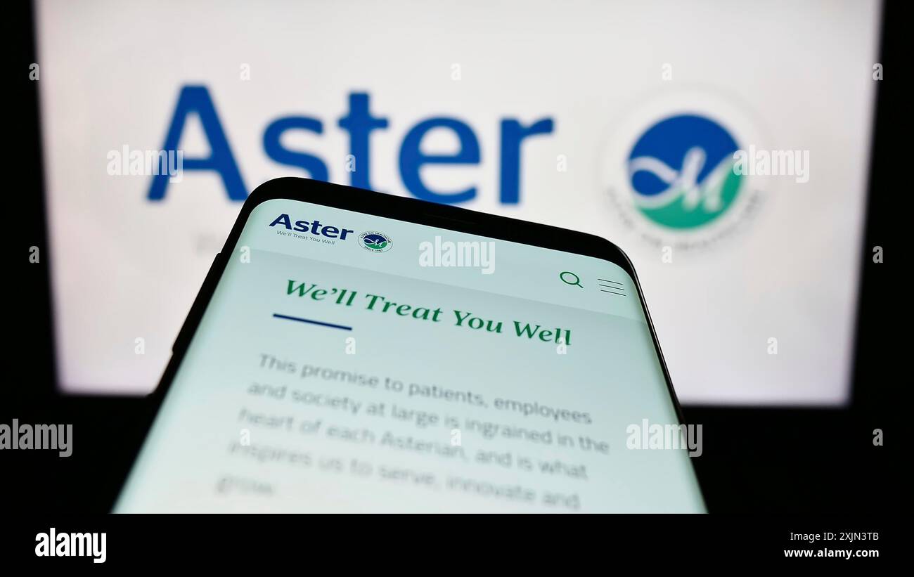 Stuttgart, Germany, 03-22-2023: Smartphone with website of health company Aster DM Healthcare ...