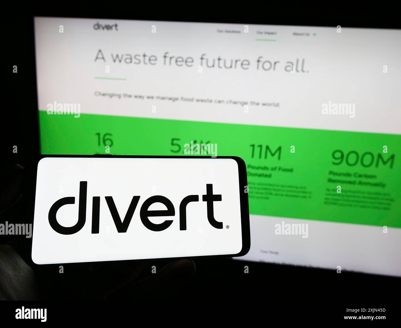 Stuttgart, Germany, 03-25-2023: Person holding cellphone with logo of ...