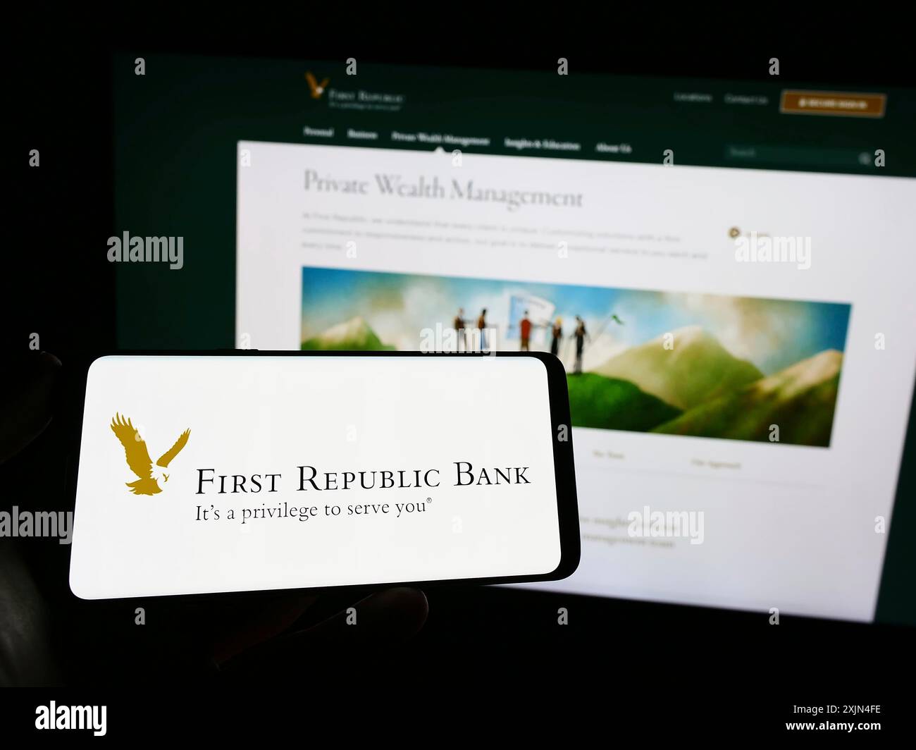 Stuttgart, Germany, 04-01-2023: Person holding mobile phone with logo ...