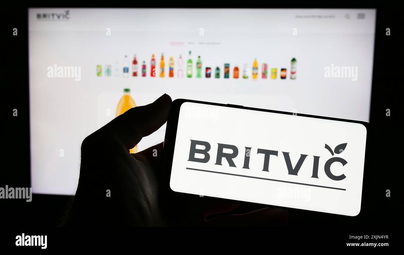 Stuttgart, Germany, 04-02-2023: Person holding cellphone with logo of ...