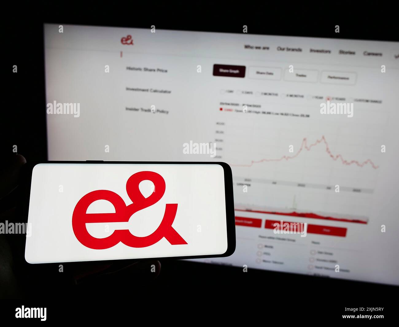 Stuttgart, Germany, 04-23-2023: Person holding mobile phone with logo ...