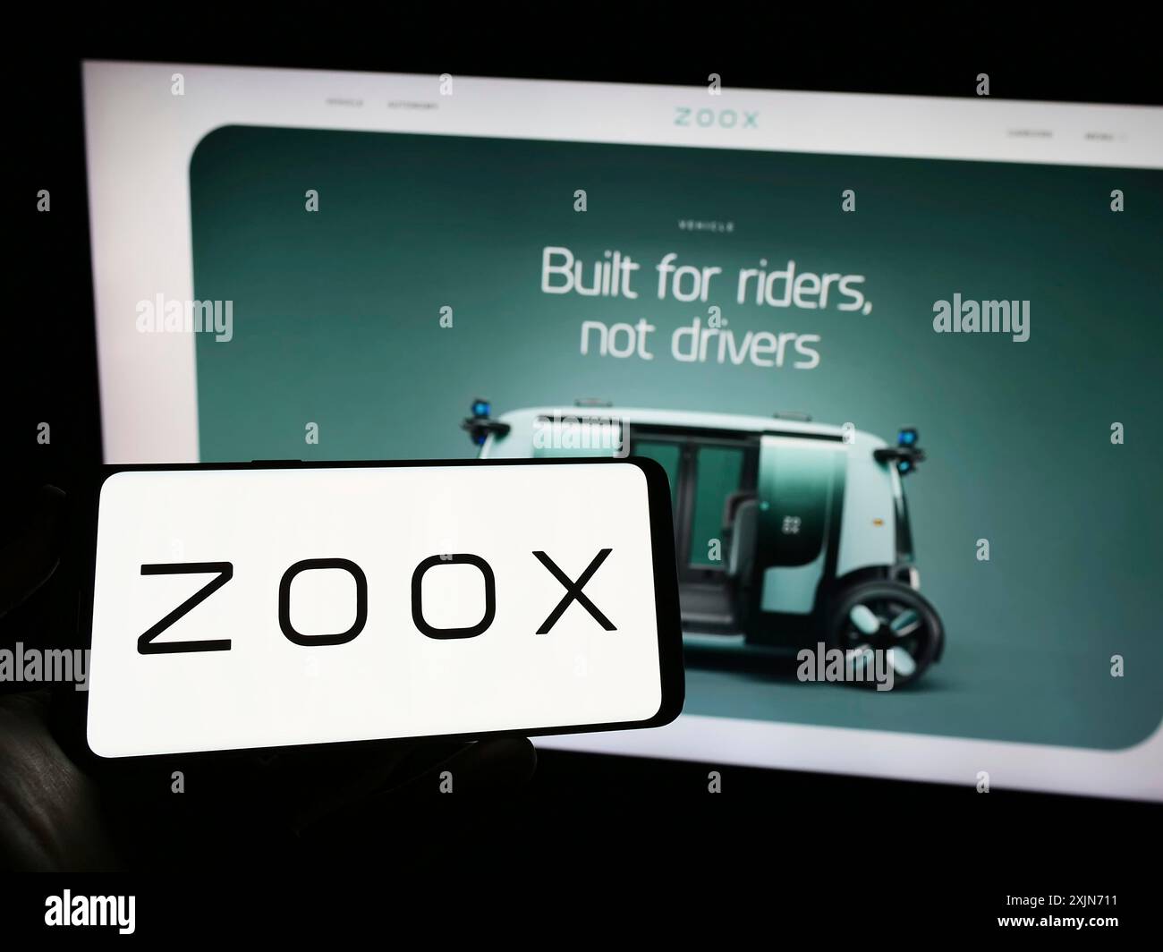 Stuttgart, Germany, 03-19-2023: Person holding mobile phone with logo ...