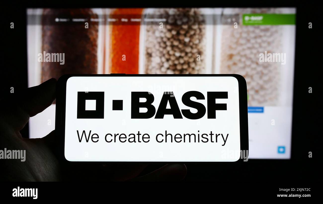 Stuttgart, Germany, 03-25-2023: Person holding cellphone with logo of ...