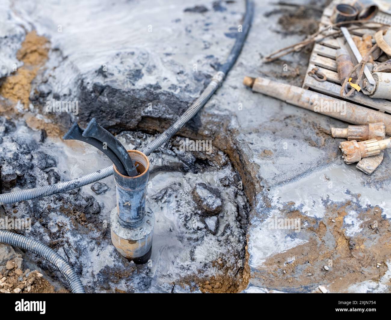 Casing pipe with polyethylene ground loop pipes in the process of being ...