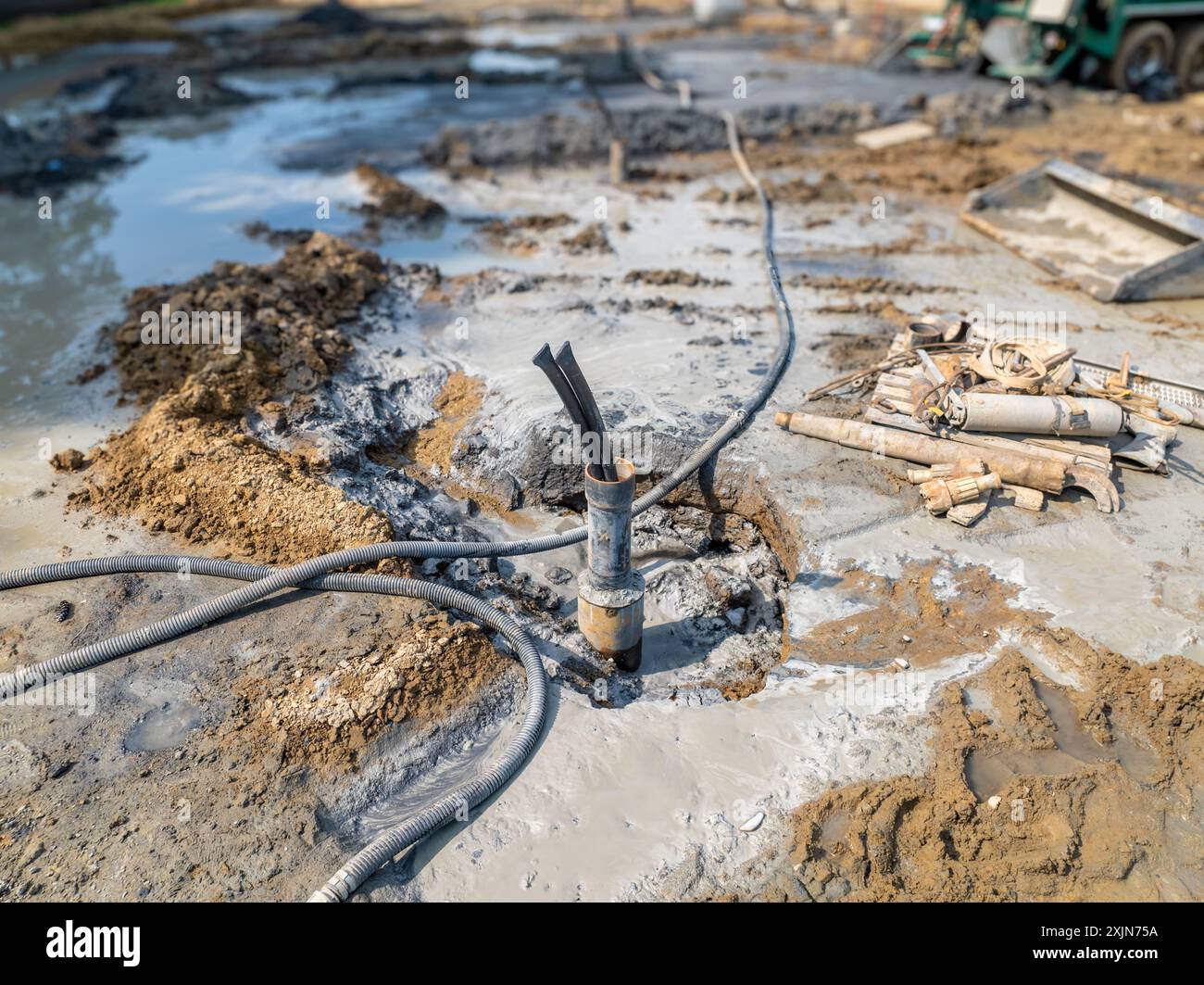 Casing pipe with polyethylene ground loop pipes in the process of being ...