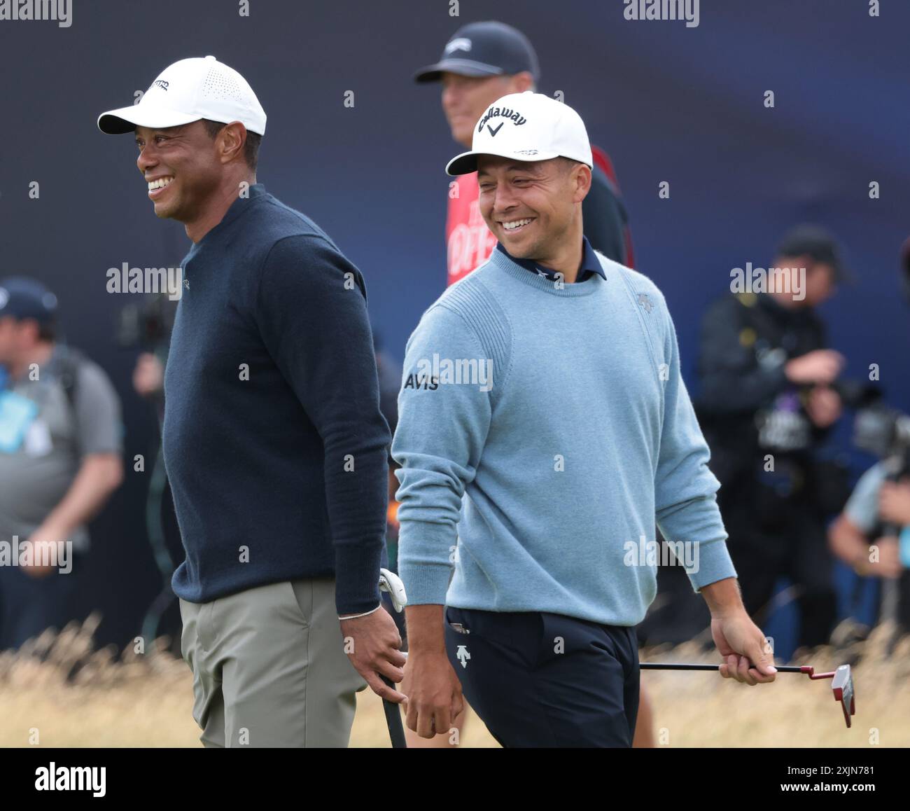 Troon, UK. 19th July, 2024. American Tiger Woods laughs with Xander ...