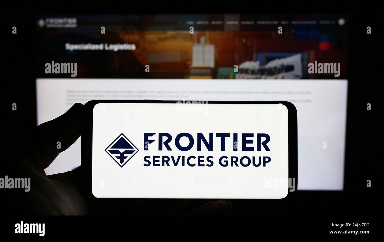 Stuttgart, Germany, 06-19-2023: Person holding smartphone with logo of ...