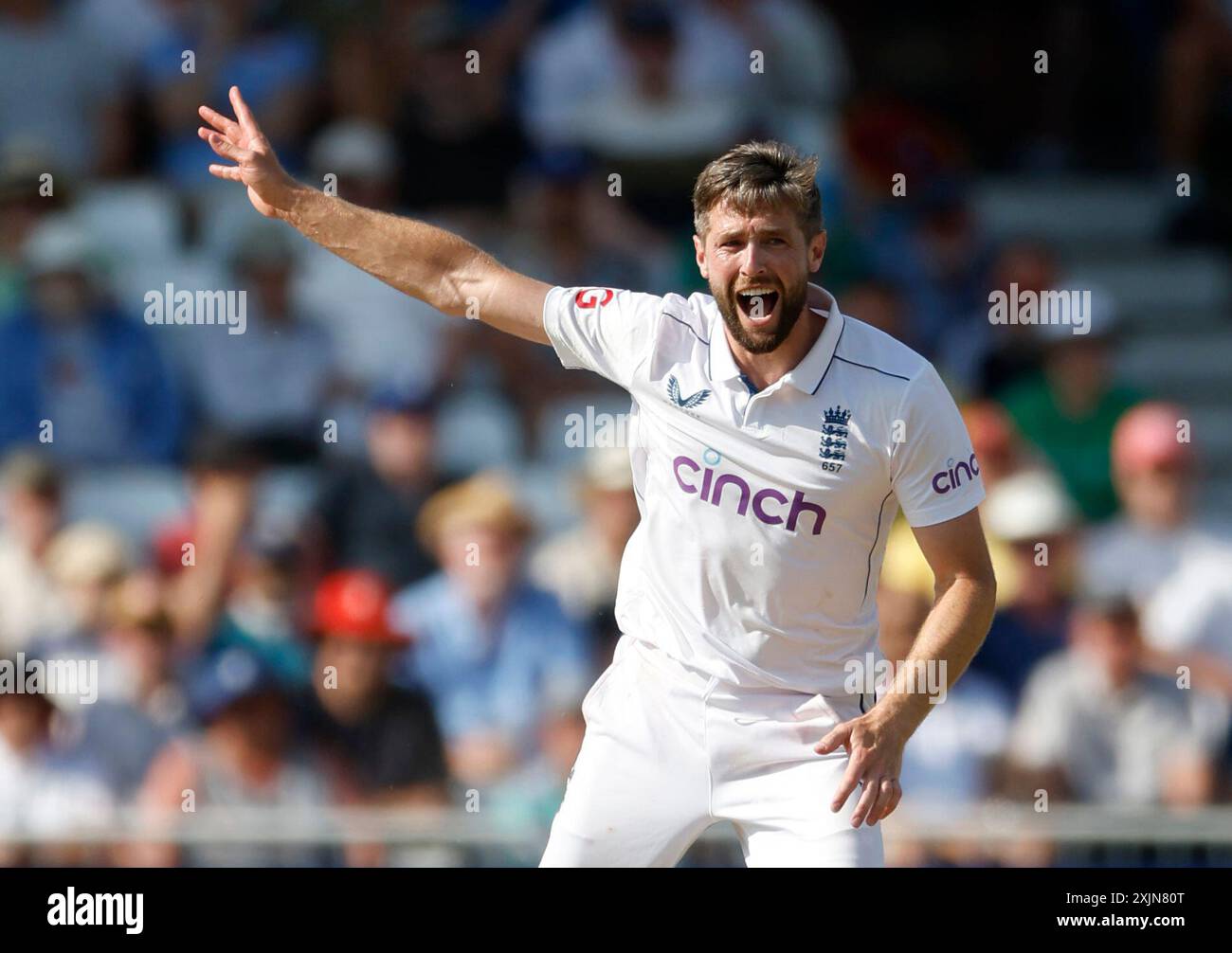 England's Chris Woakes appeals to an umpire unsuccessfully during day ...