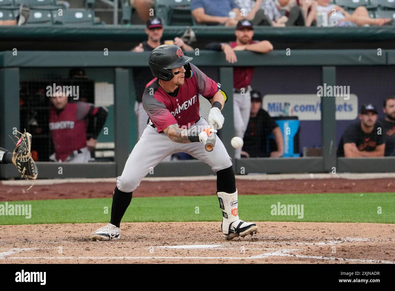 July 13 2024: Sacramento shortstop Christian Koss (31) bunts for a hit ...