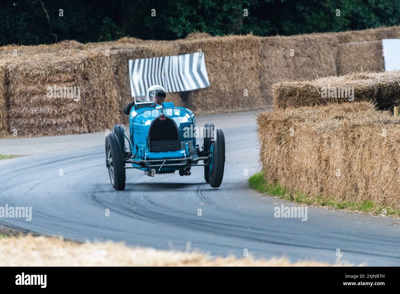 1927 Bugatti Type 35B race car driving up the hill climb track at the ...