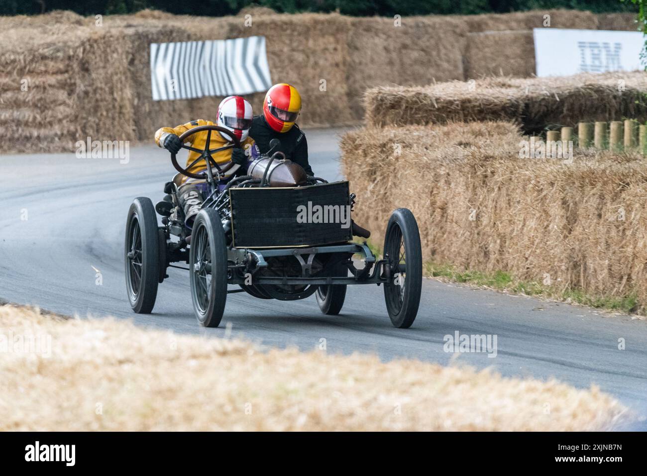 1905 Darracq 200 HP historic racing car driving up the hill climb track ...
