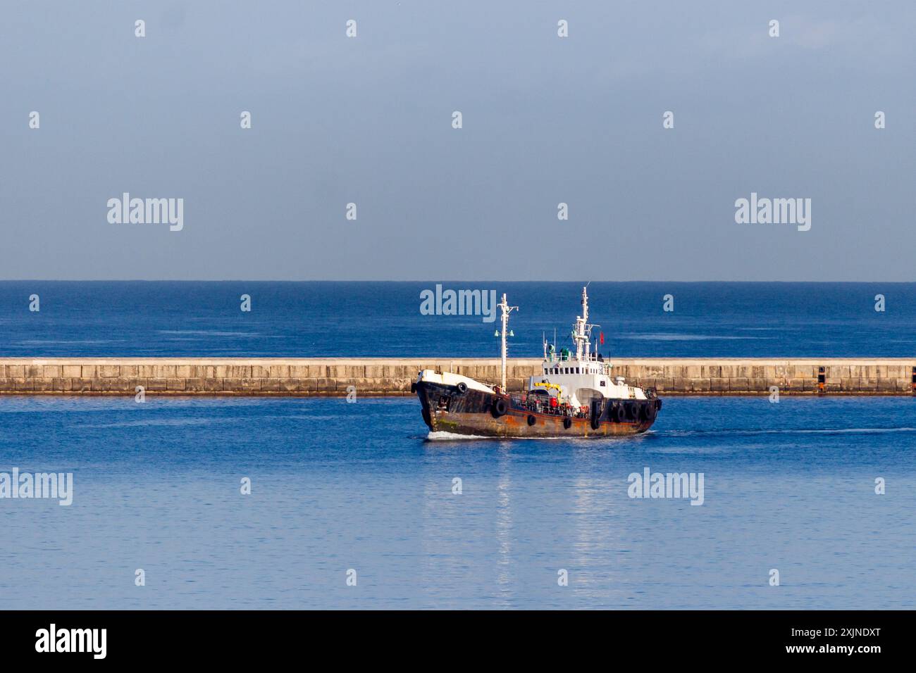 an old small ship at the Maltese harbor limits of Vittoriosa Stock ...