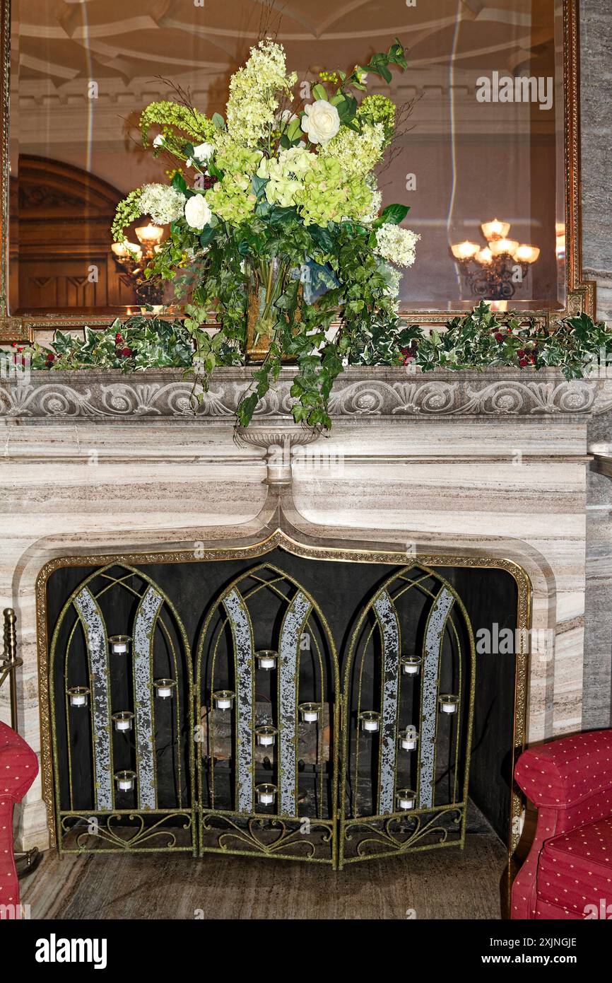 fireplace scene, ornate mantle, stone, mirror, flowers, tile floor ...