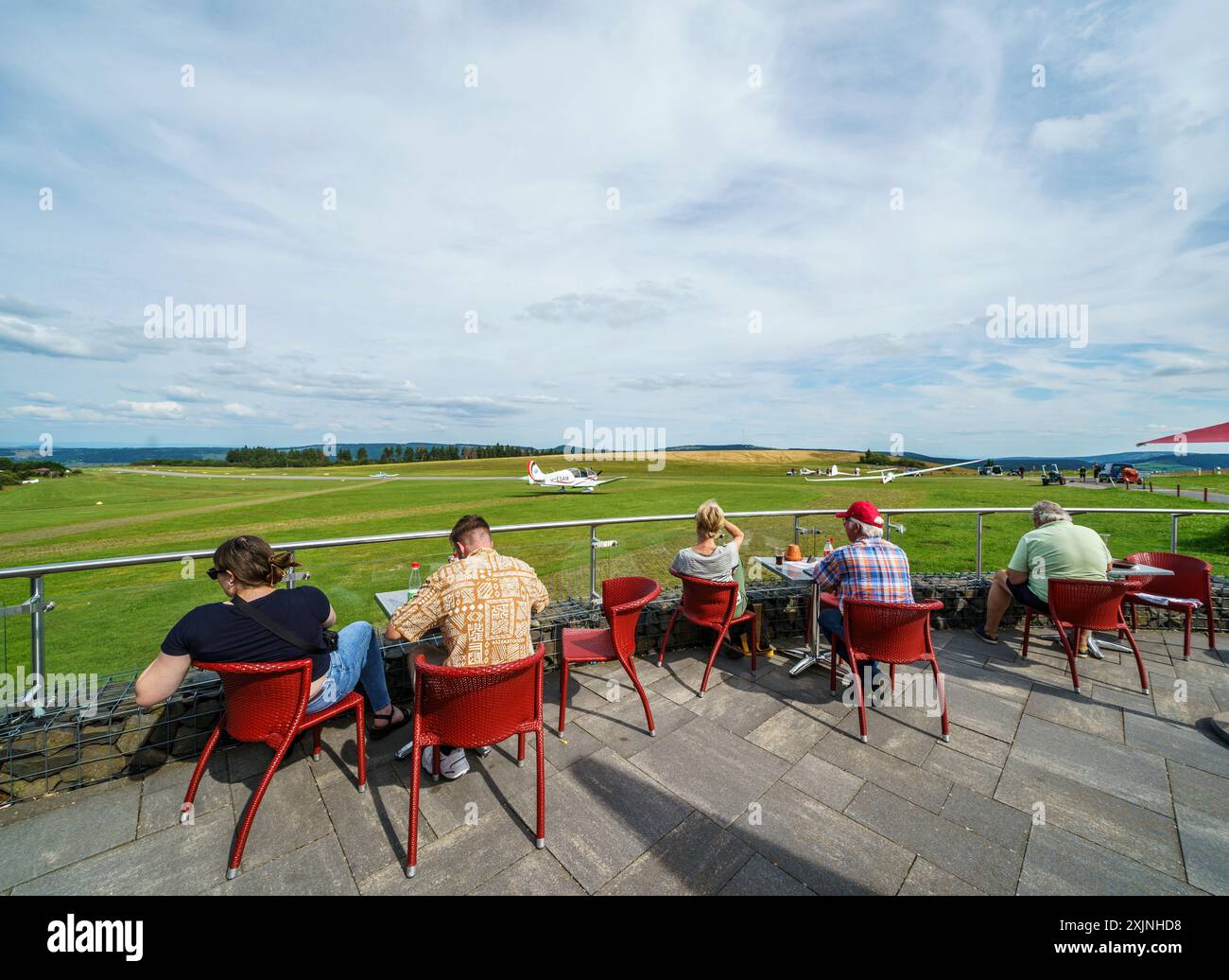 PRODUCTION - 18 July 2024, Hesse, Gersfeld (Röhn): People watch the ...