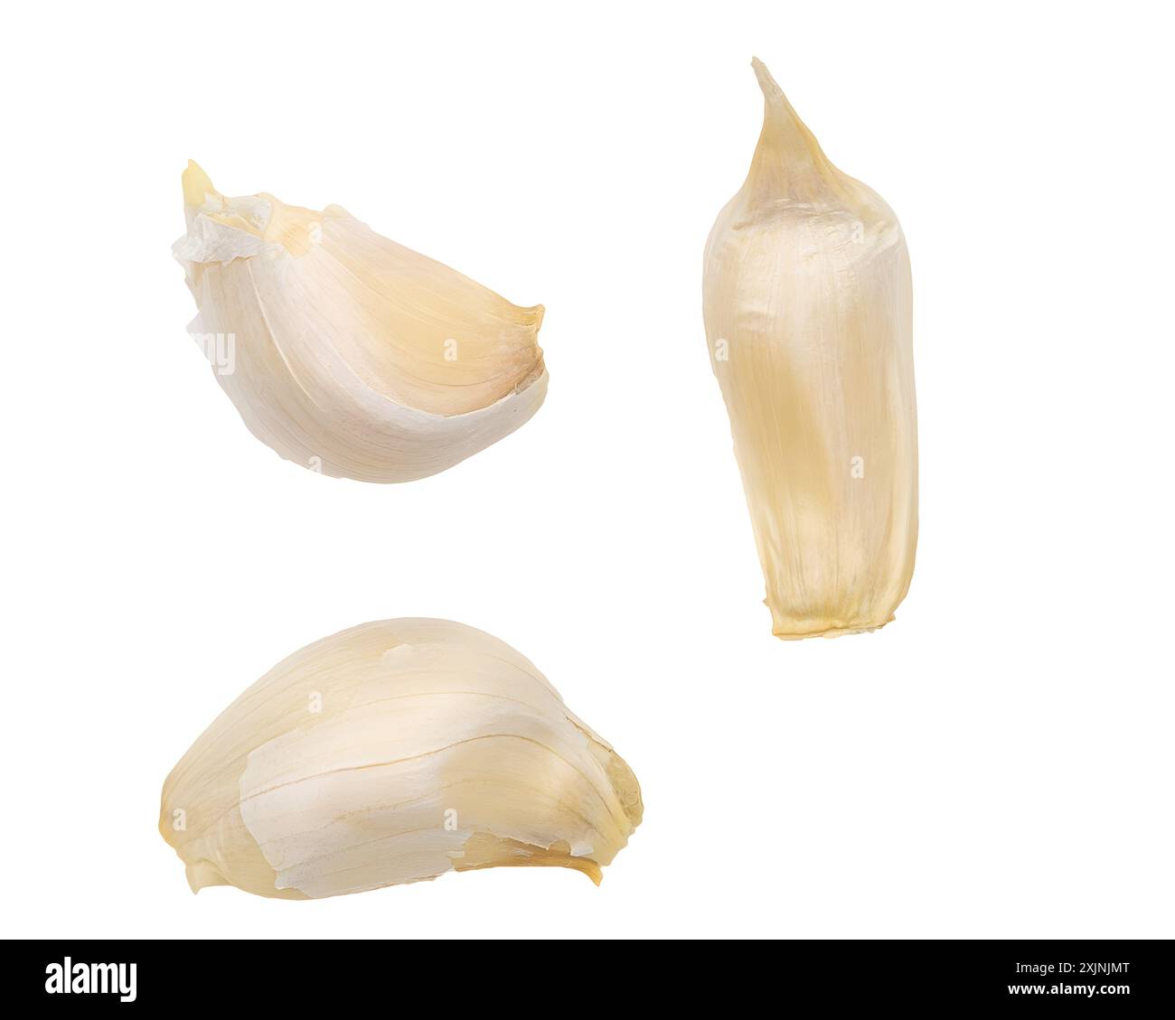 Top view set of 3 unpeeled garlic cloves isolated on a white background ...