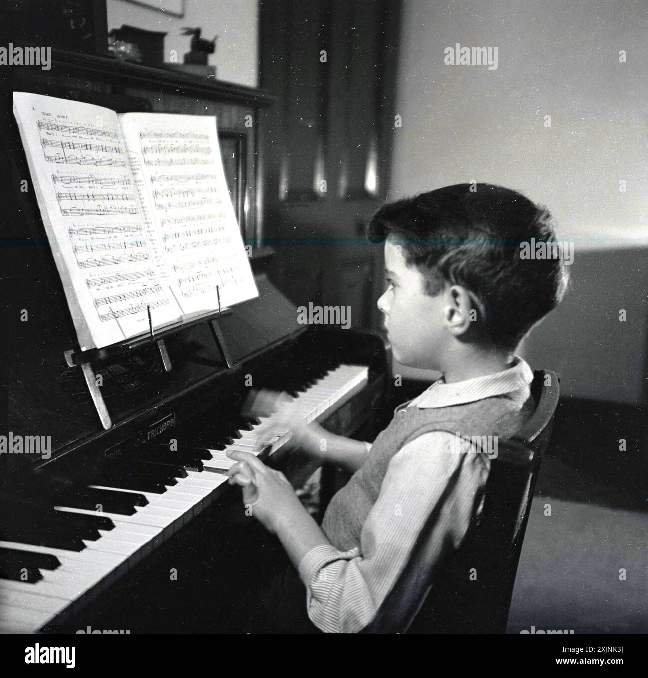 Piano in library music room hi-res stock photography and images - Alamy