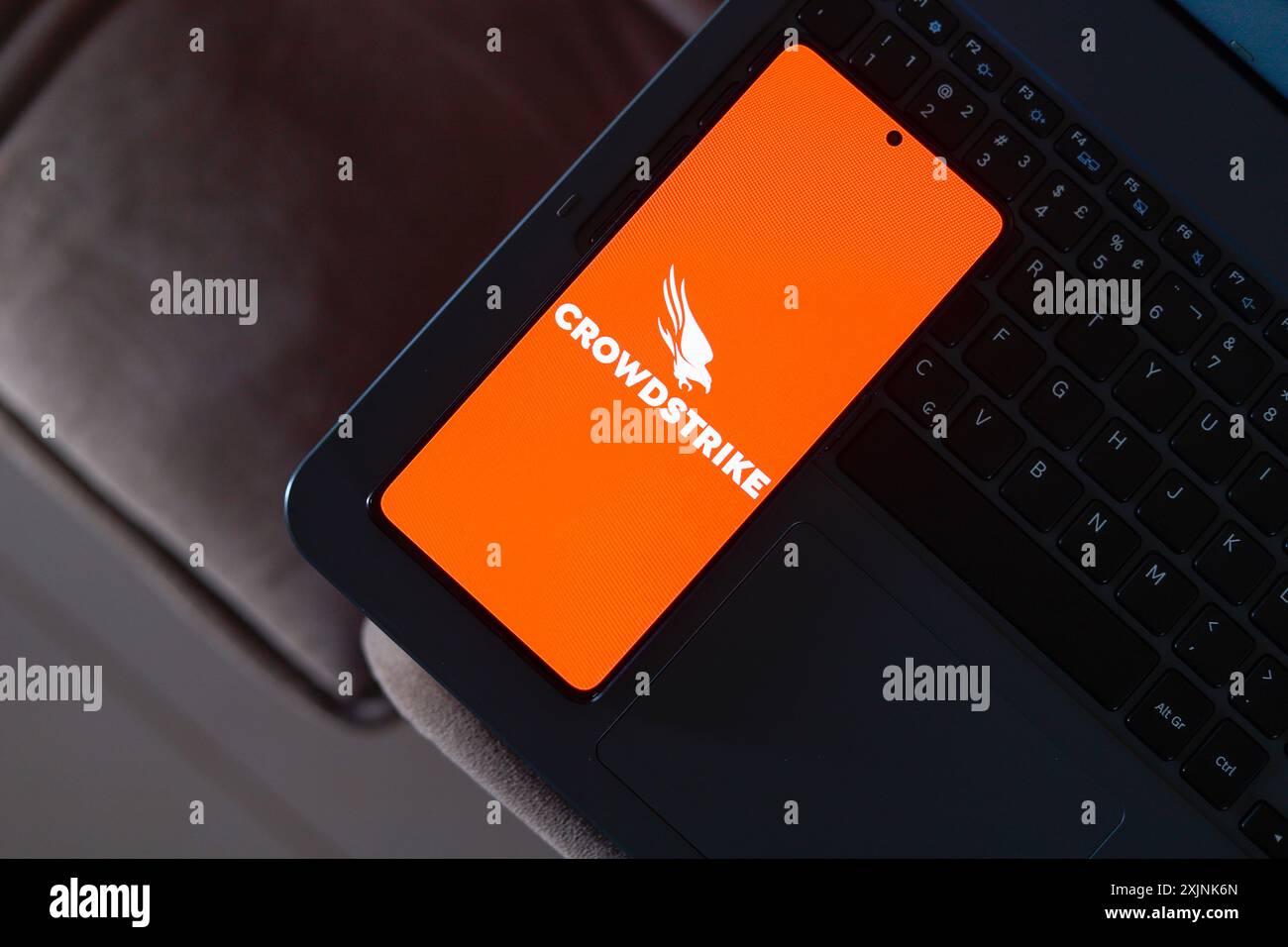 In this photo illustration, the CrowdStrike Holdings, Inc. logo is ...