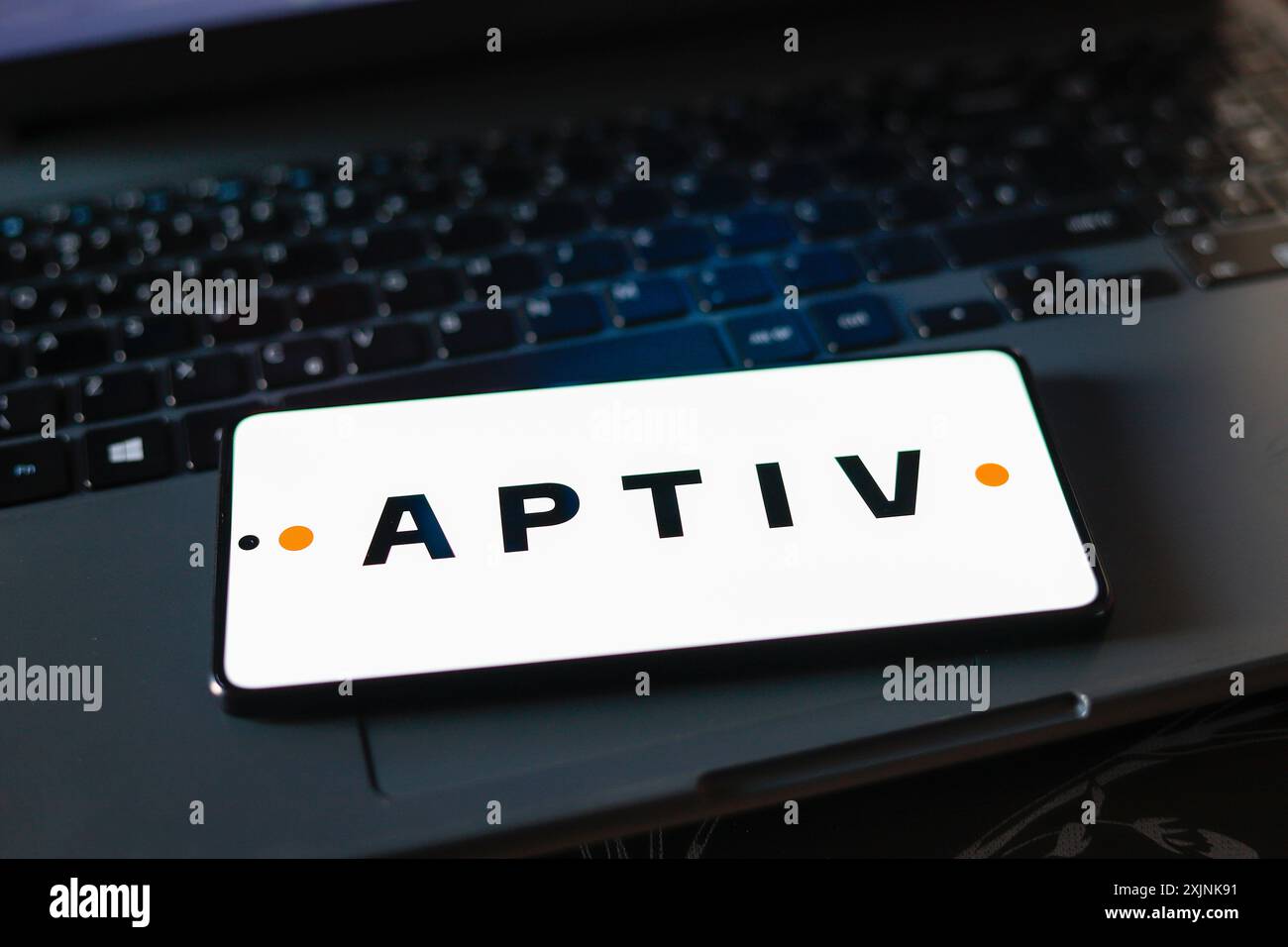 In this photo illustration, the APTIV logo is displayed on a smartphone ...