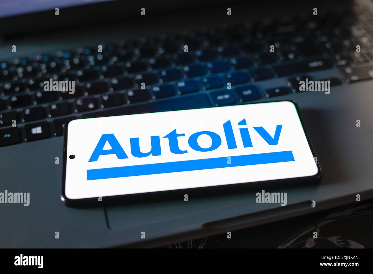 In this photo illustration, the Autoliv logo is displayed on a smartphone screen Stock Photo - Alamy