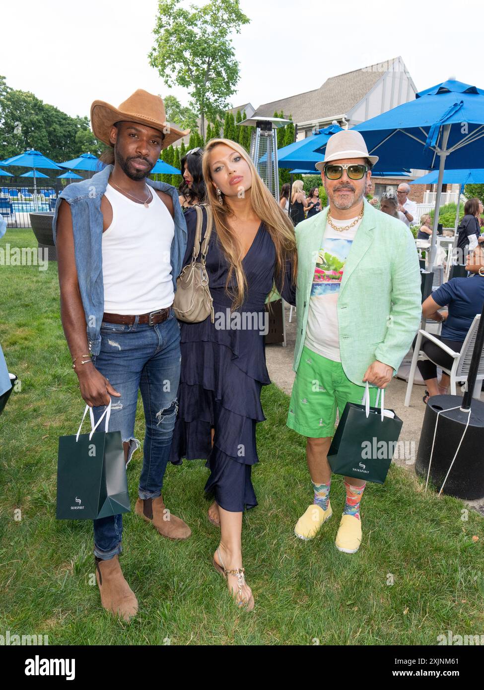 Cash, Alice Naegel and Eric Andrew Ruiz attends the SkinSpirit ...