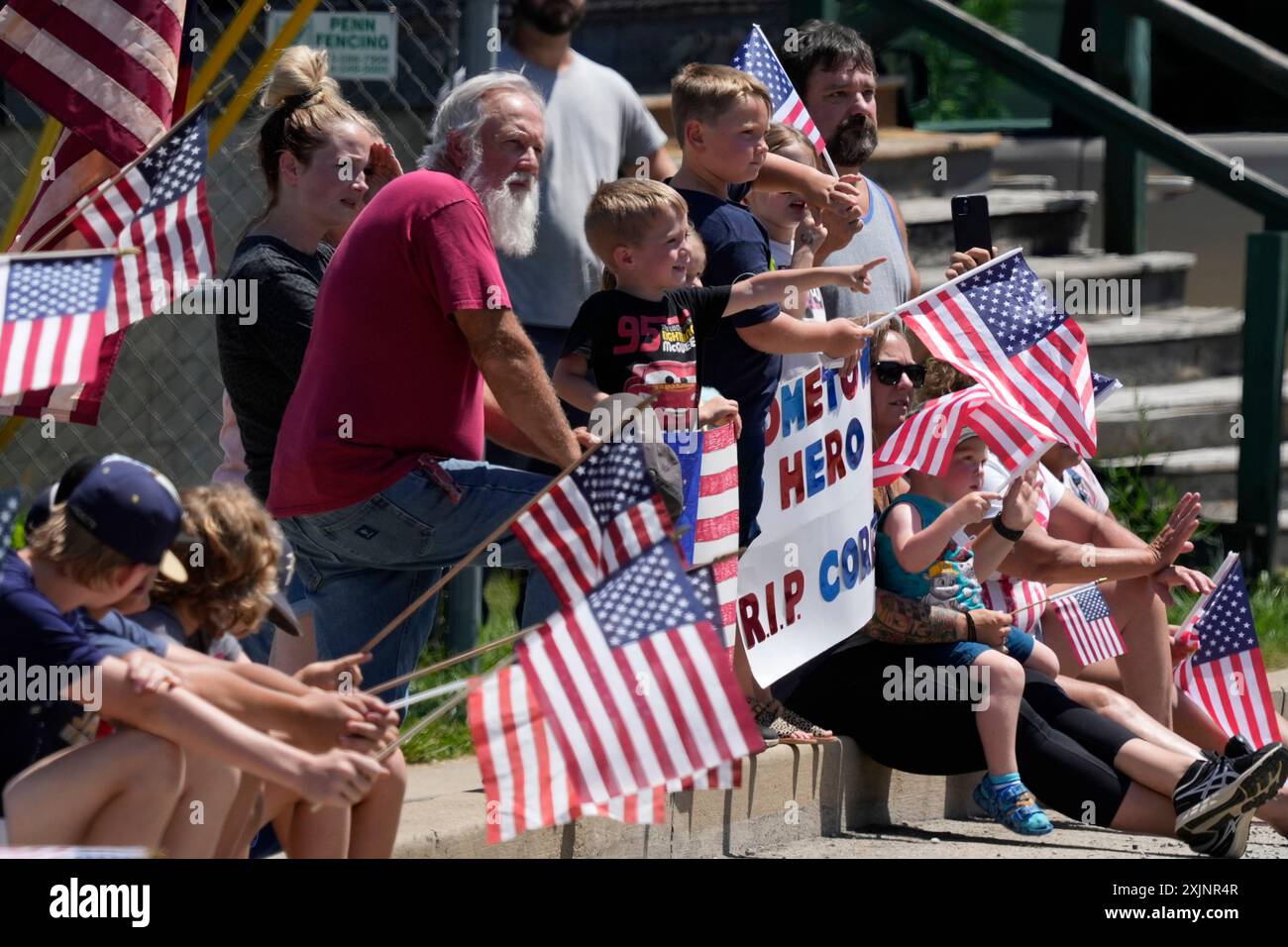 Area residents watch as a funeral procession for Corey Comperatore ...