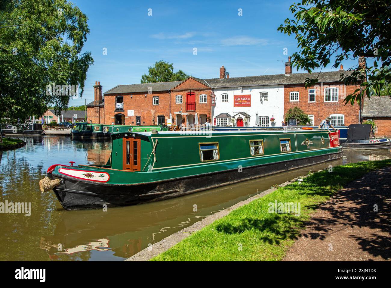 Canal narrowboat leaving the Trent and Mersey canal canal at Fradley ...