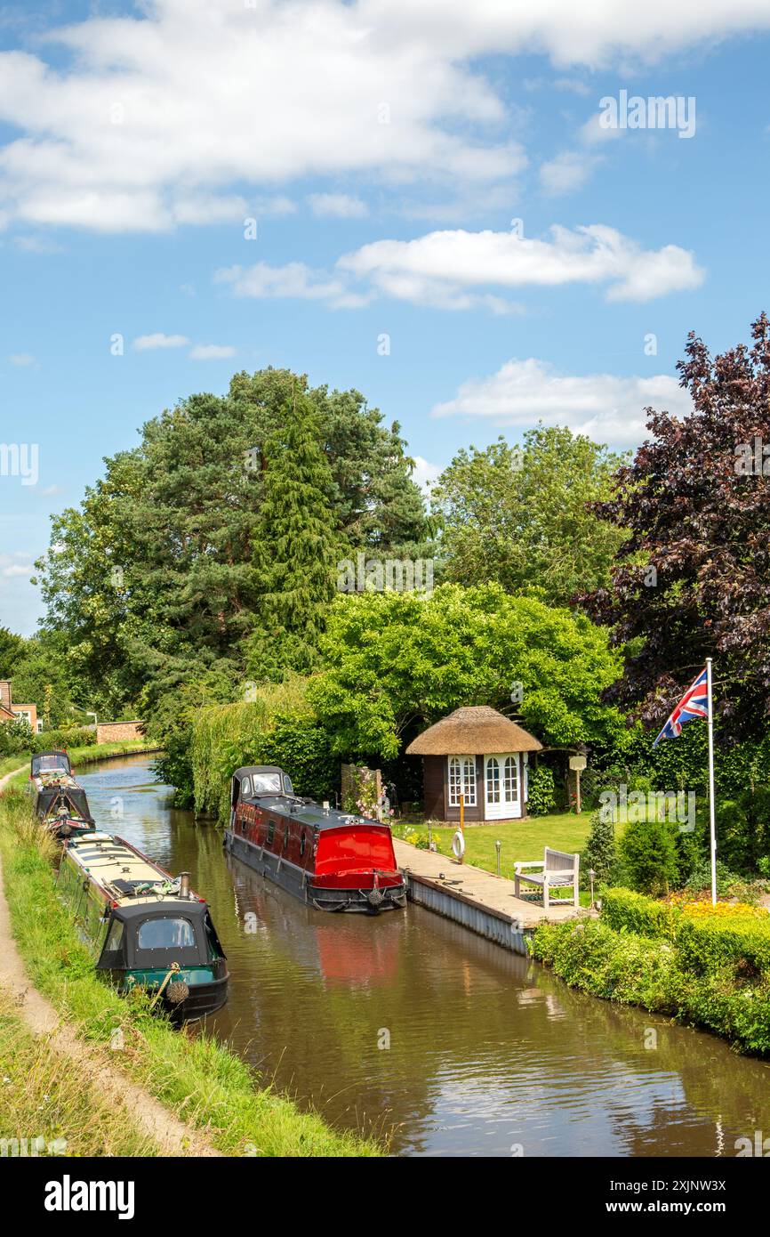 Canal narrowboats moored on the Trent and Mersey canal at Alrewas ...