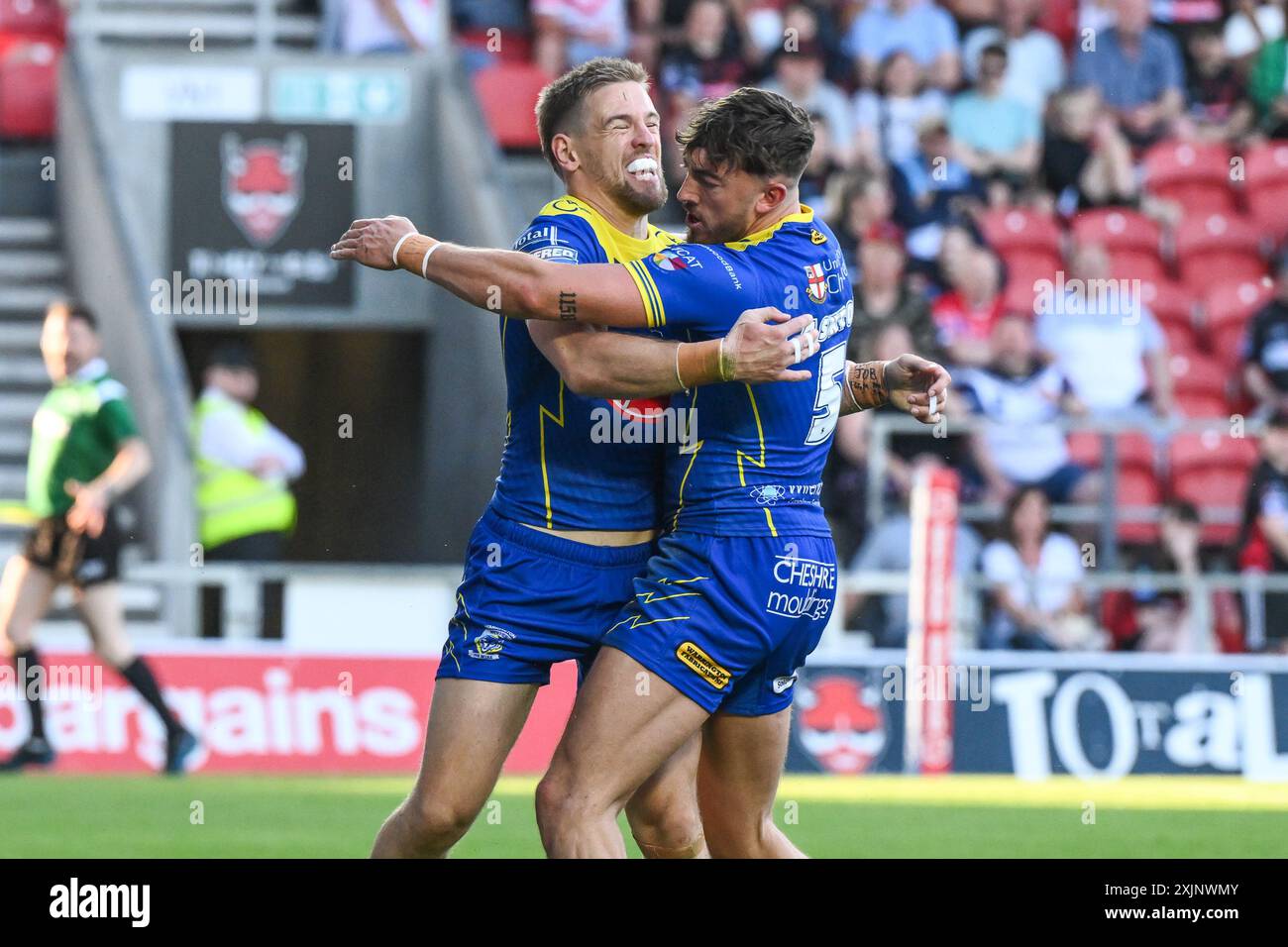 Matt Dufty of Warrington Wolves celebrates his try during the Betfred ...