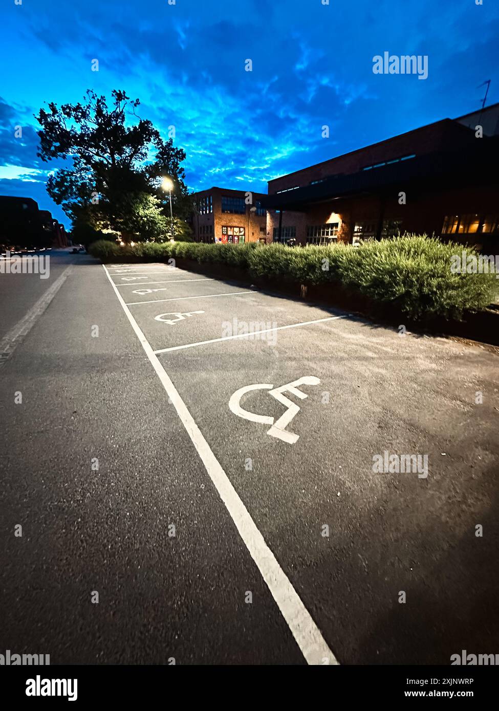 Empty car parking lot at a supermarket with family and disability ...