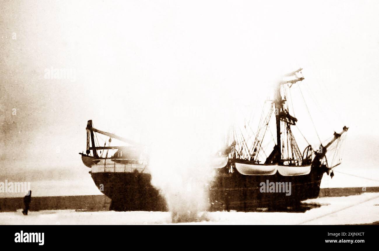 A whaling ship from Dundee, Scotland, blasting the ice off Greenland in ...
